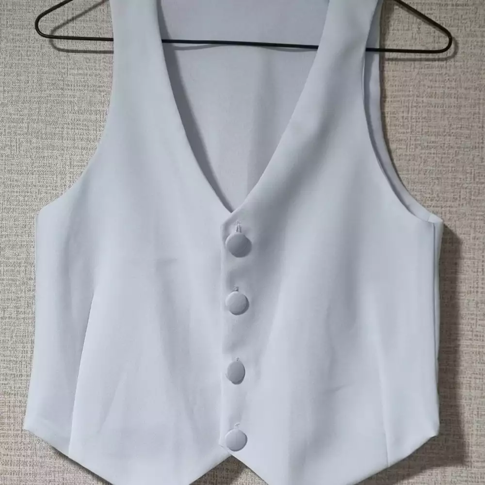 Chaleco blanco tipo sastre - La Plaza Morada